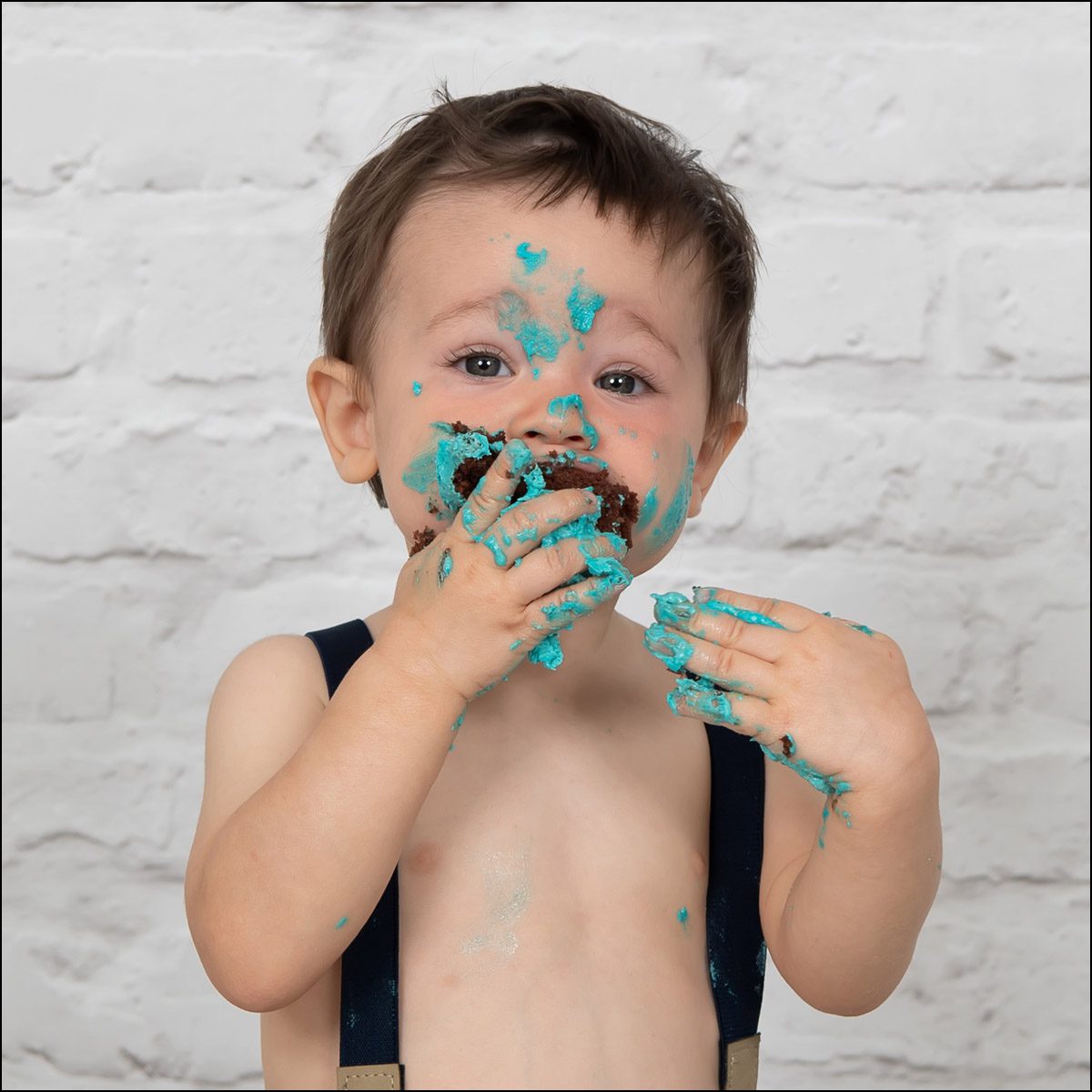 Lucas the cake destroyer | Julian Porter Photography